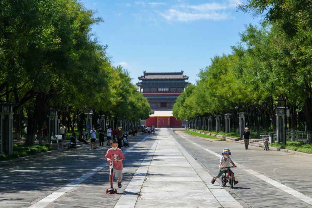 镜头里的十年·奔向美好丨穿越中轴线 看北京点滴之变-广东台荔枝网